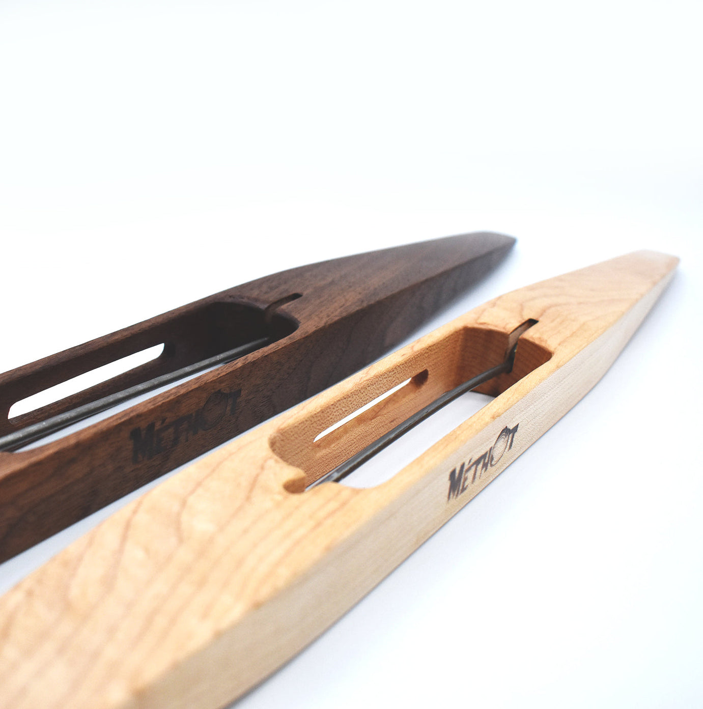 Handcrafted boat shuttles — Tisse et File