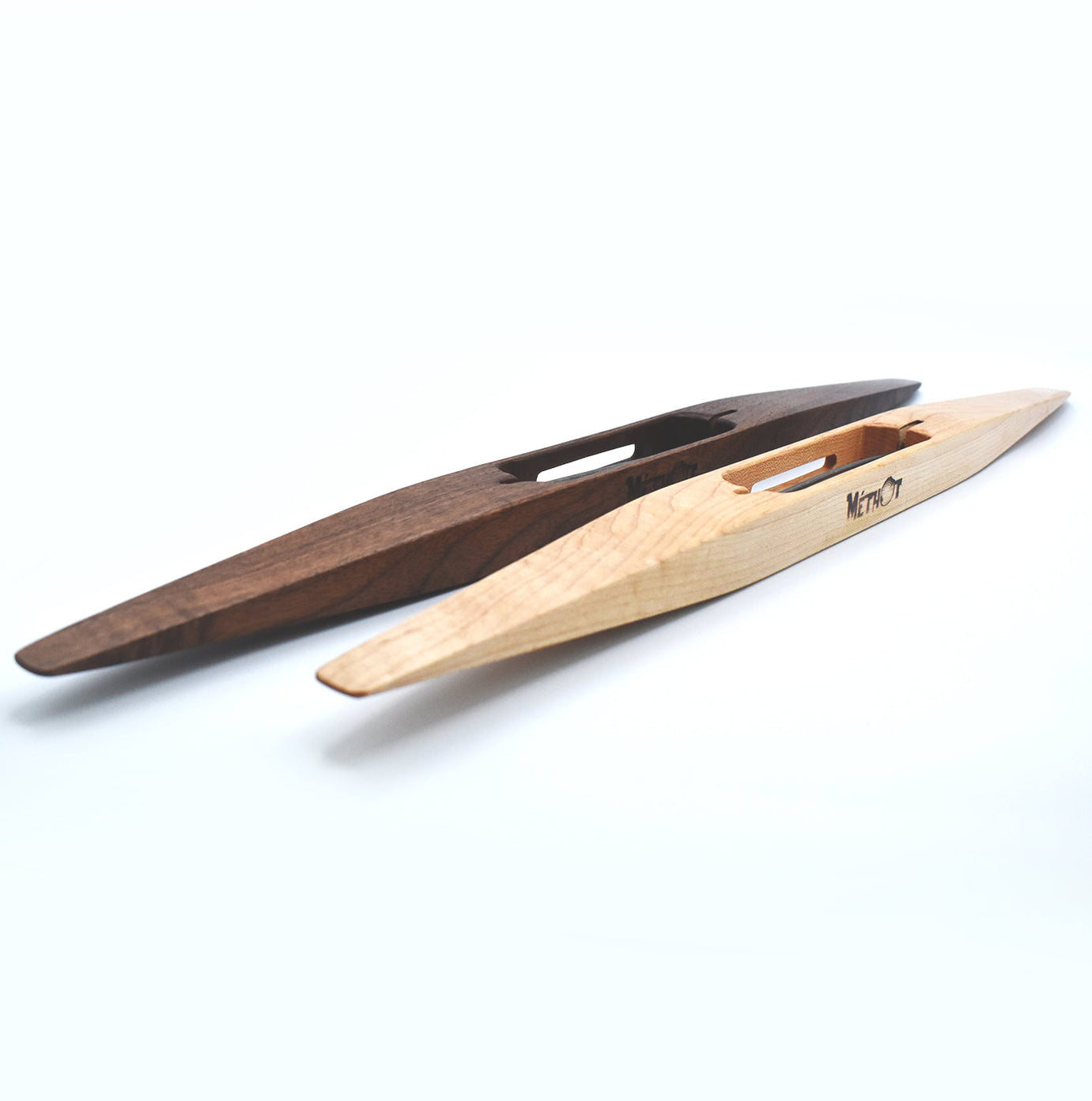 Handcrafted boat shuttles — Tisse et File